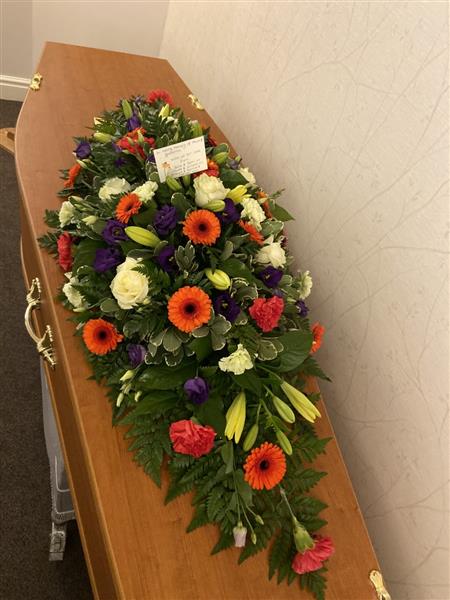 Vibrant Casket Spray - Funeral Flowers Pinner